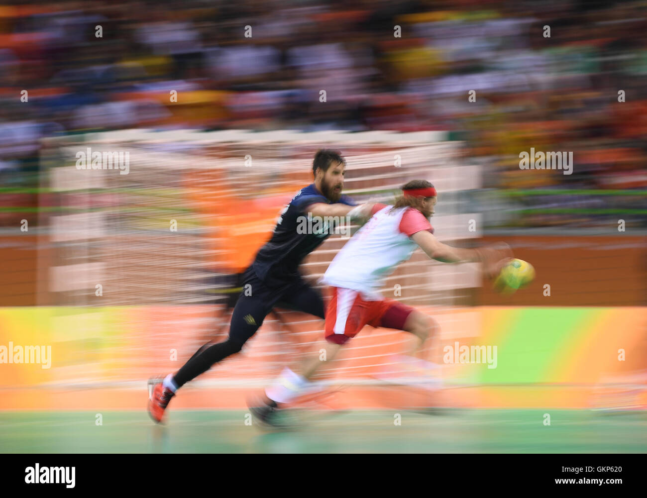 Rio de Janeiro, Brazil. 21st Aug, 2016. Mikkel Hansen (R) of Denmark ...