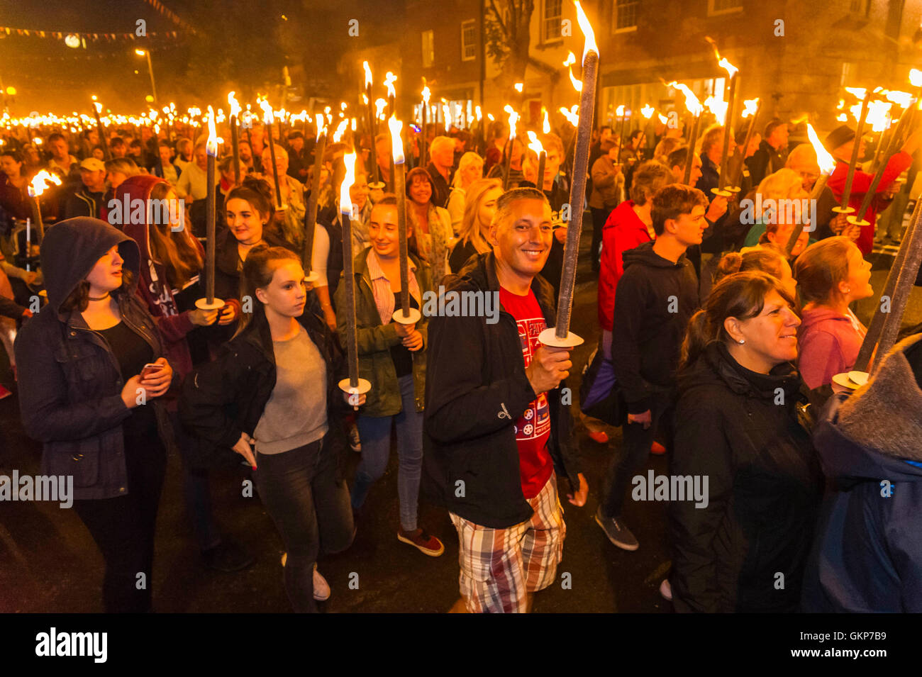 Bridport, Dorset, UK. 21st Aug, 2016. About 2,000 people with flaming ...