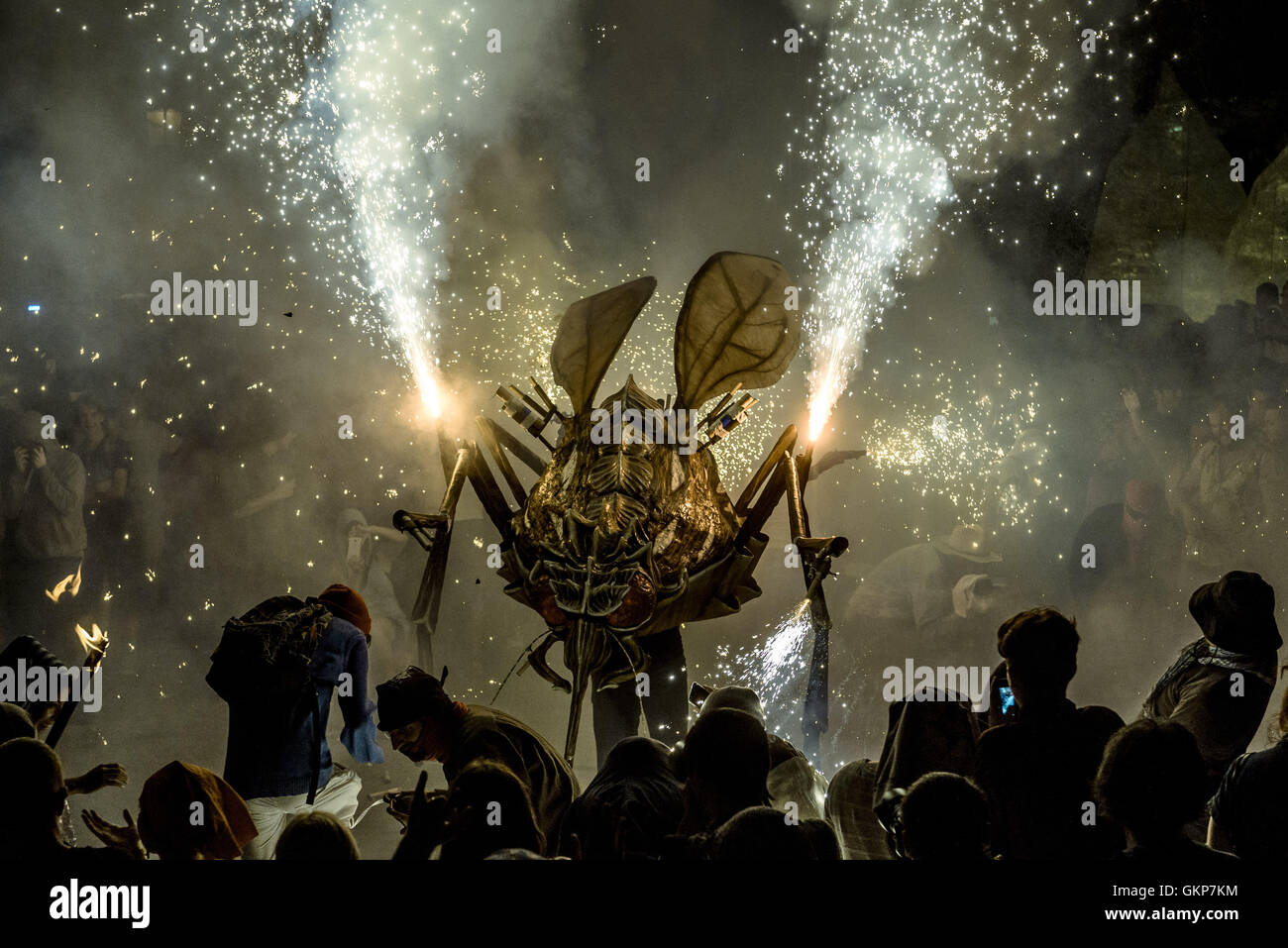 Barcelona, Catalonia, Spain. 21st Aug, 2016. A fire beast sets off his ...