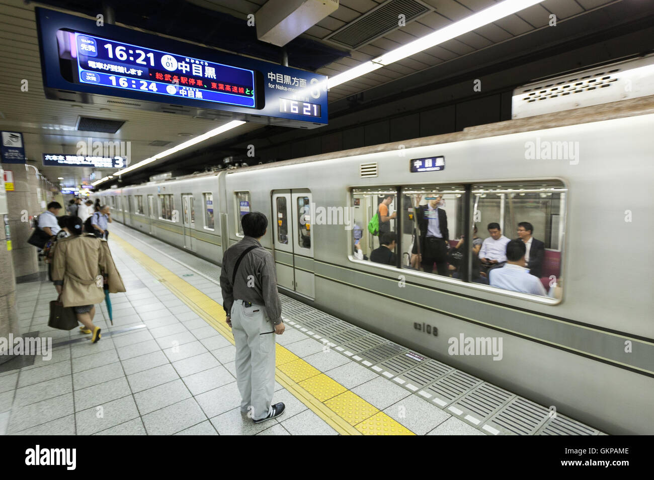 A new model of signboard on display at Kasumigaseki Station on August ...