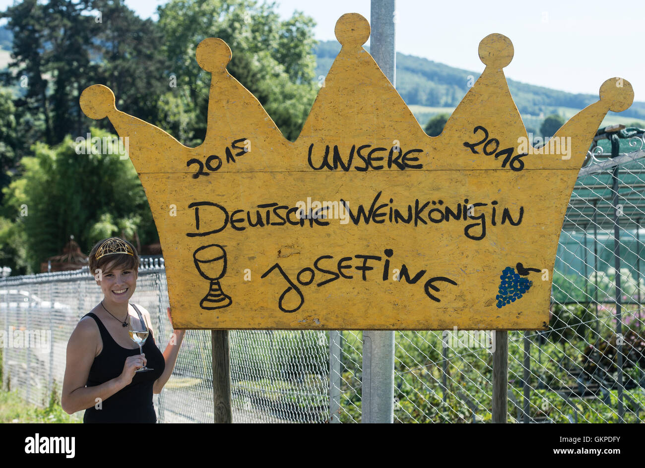 The German Wine Queen Josefine Schlumberger posing next to a huge crown ...