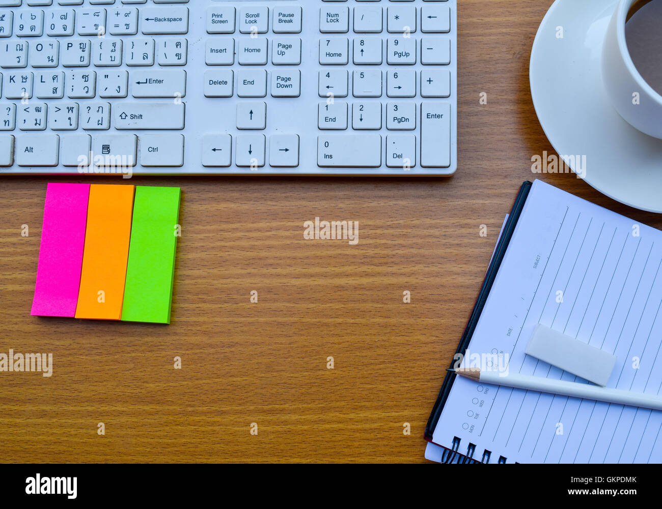 office table with cup of coffee Stock Photo - Alamy