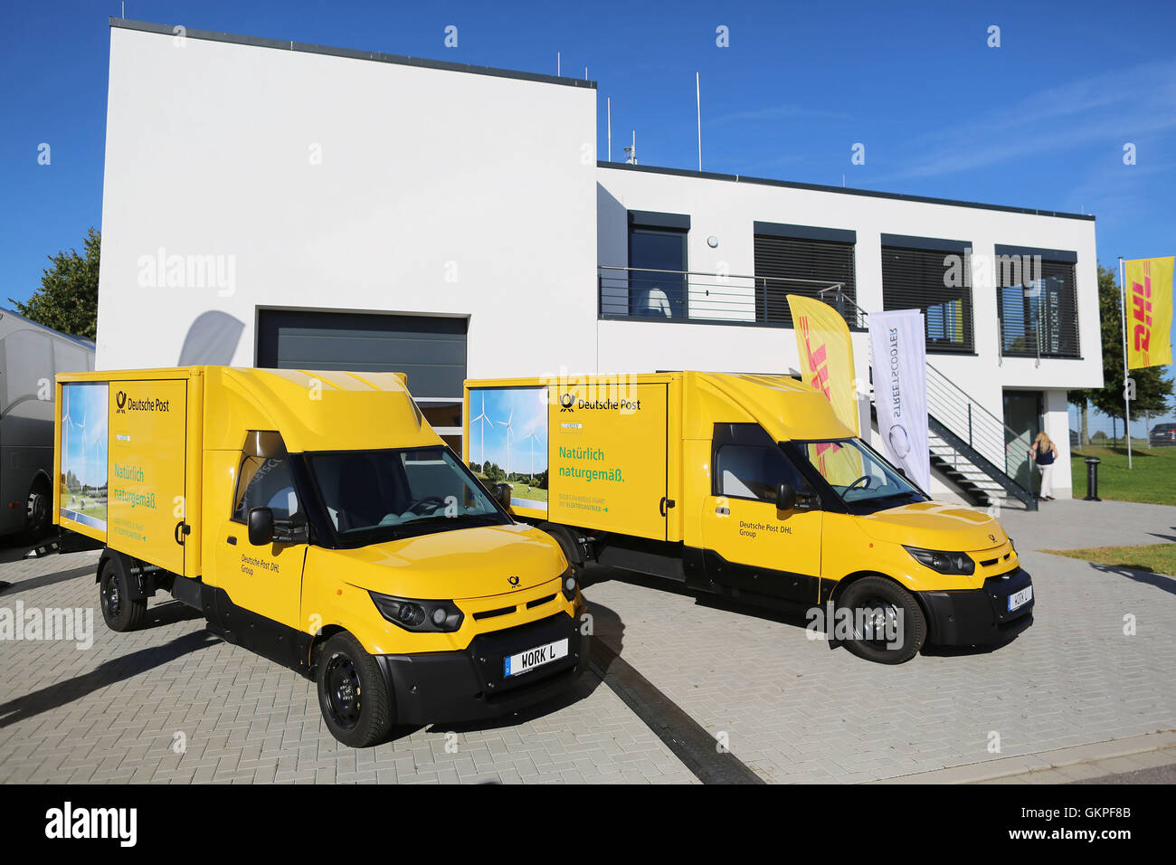 Aachen, Germany. 22nd Aug, 2016. StreetScooters of the Deutsche Post ...