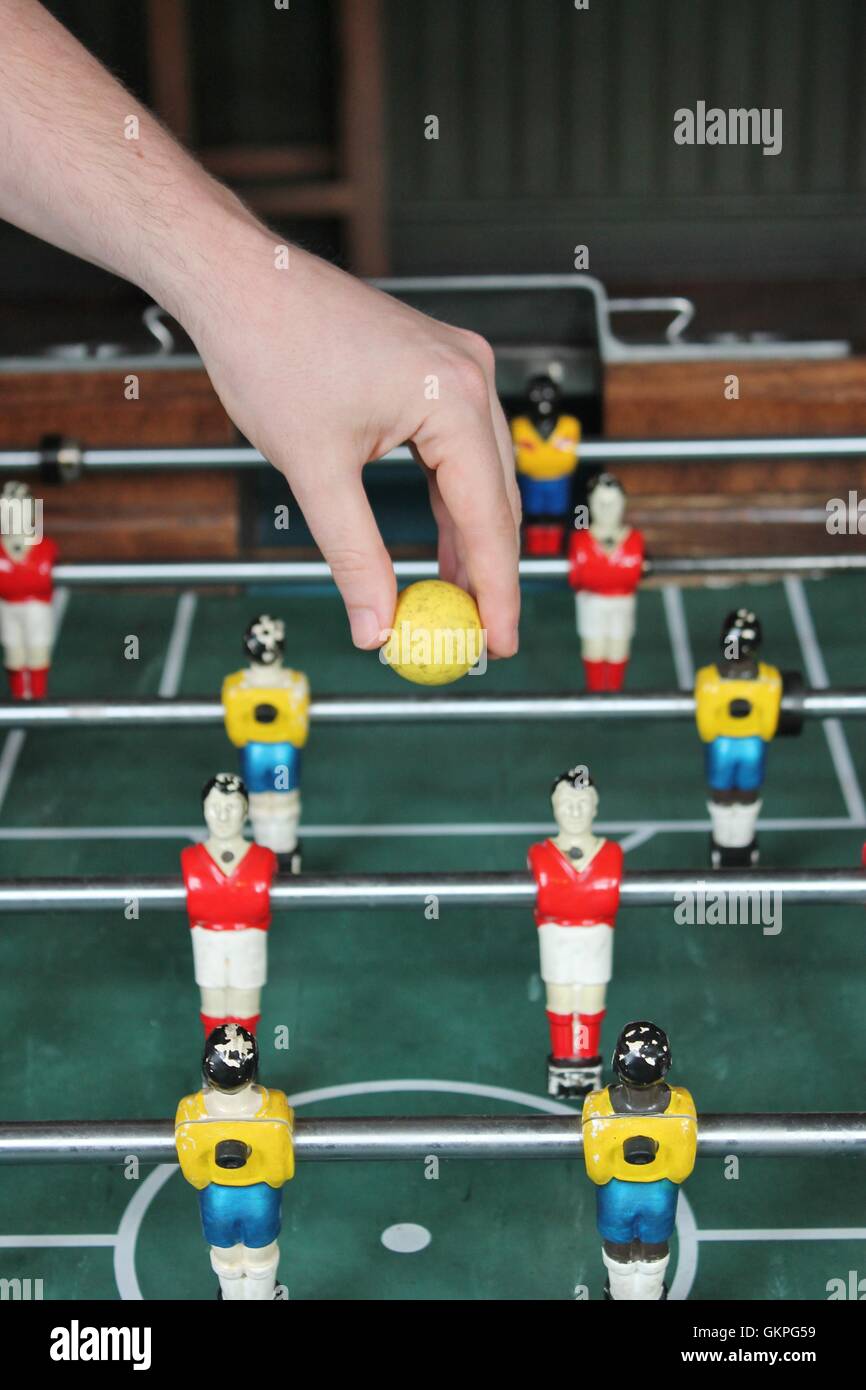 football players foosball table soccer game stock photo, stock ...
