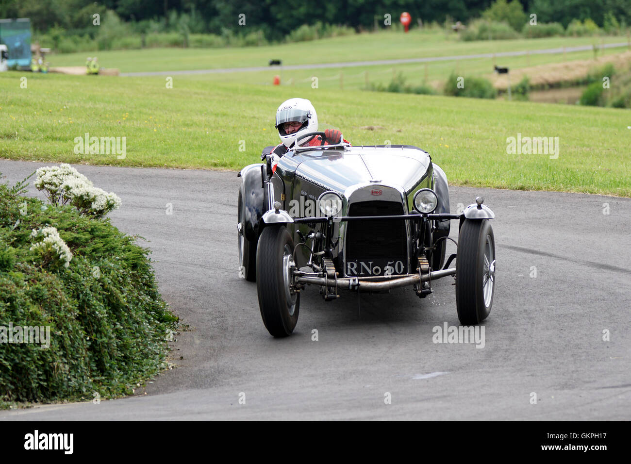 Guy Spollon throws his 1936 HRG 1.5 Litre Meadows into the roundabout ...