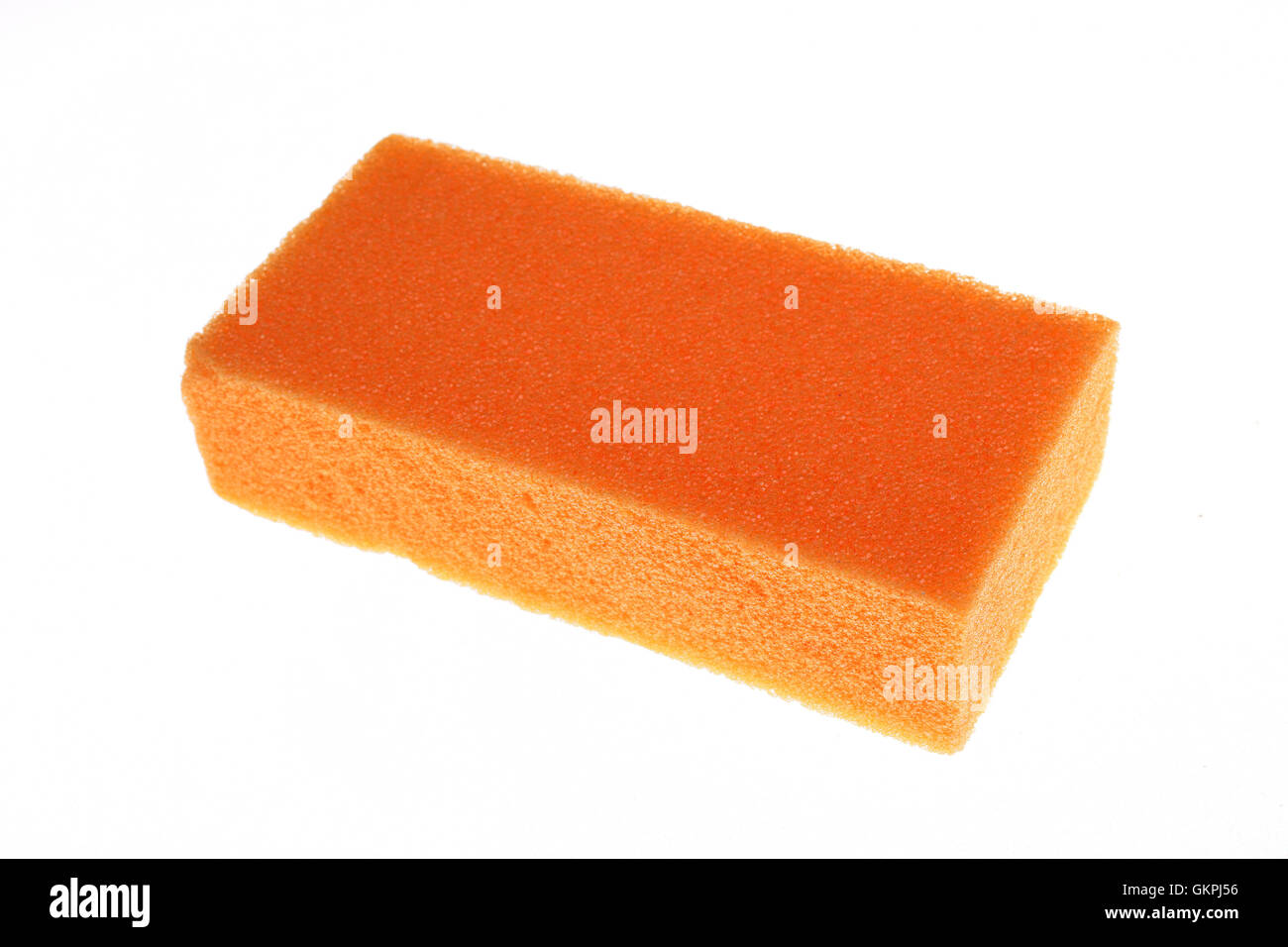 Sponge orange for washing dishes on the white background Stock Photo ...