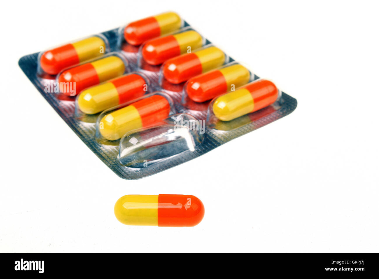 Color tablet and capsule packaging on a white background Stock Photo ...