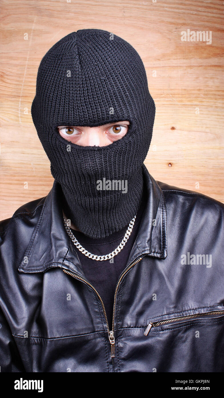 Masked thief in balaclava bandit gangster Stock Photo - Alamy