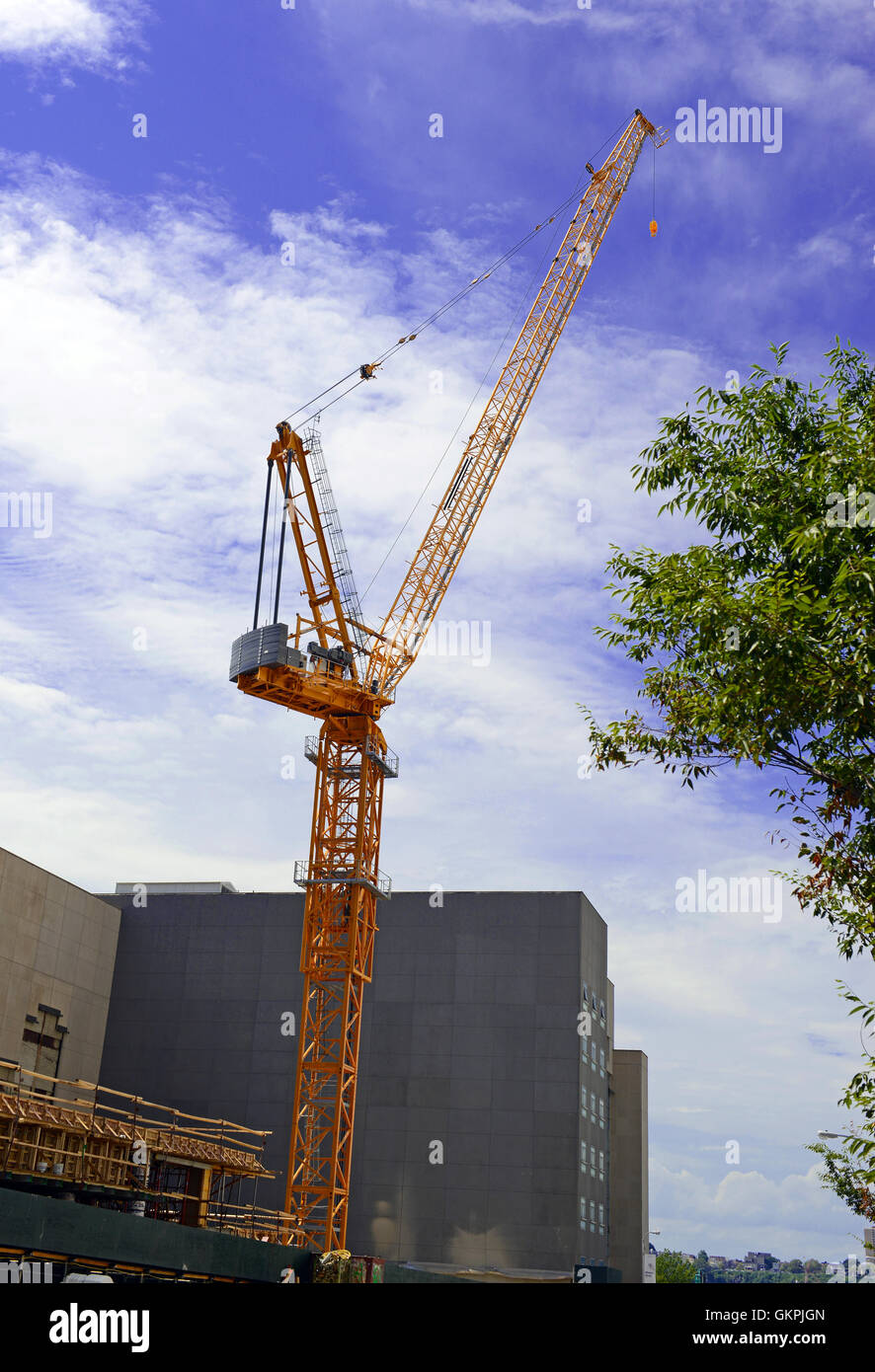 Crane at Construction site of new commercial building with skeleton ...