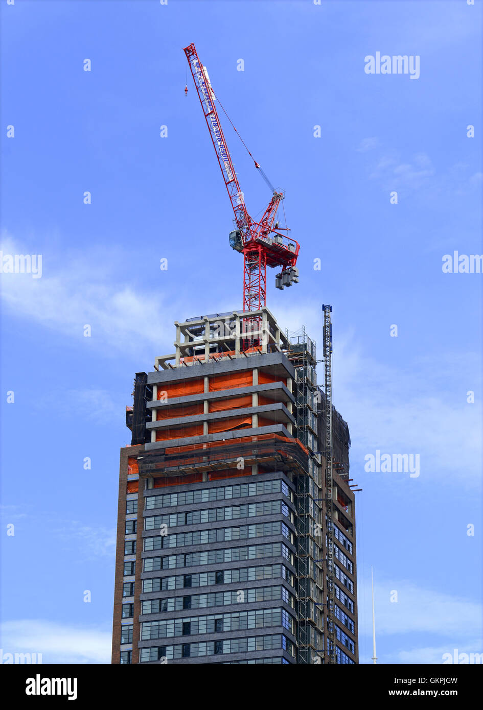 Crane at Construction site of new commercial building with skeleton ...