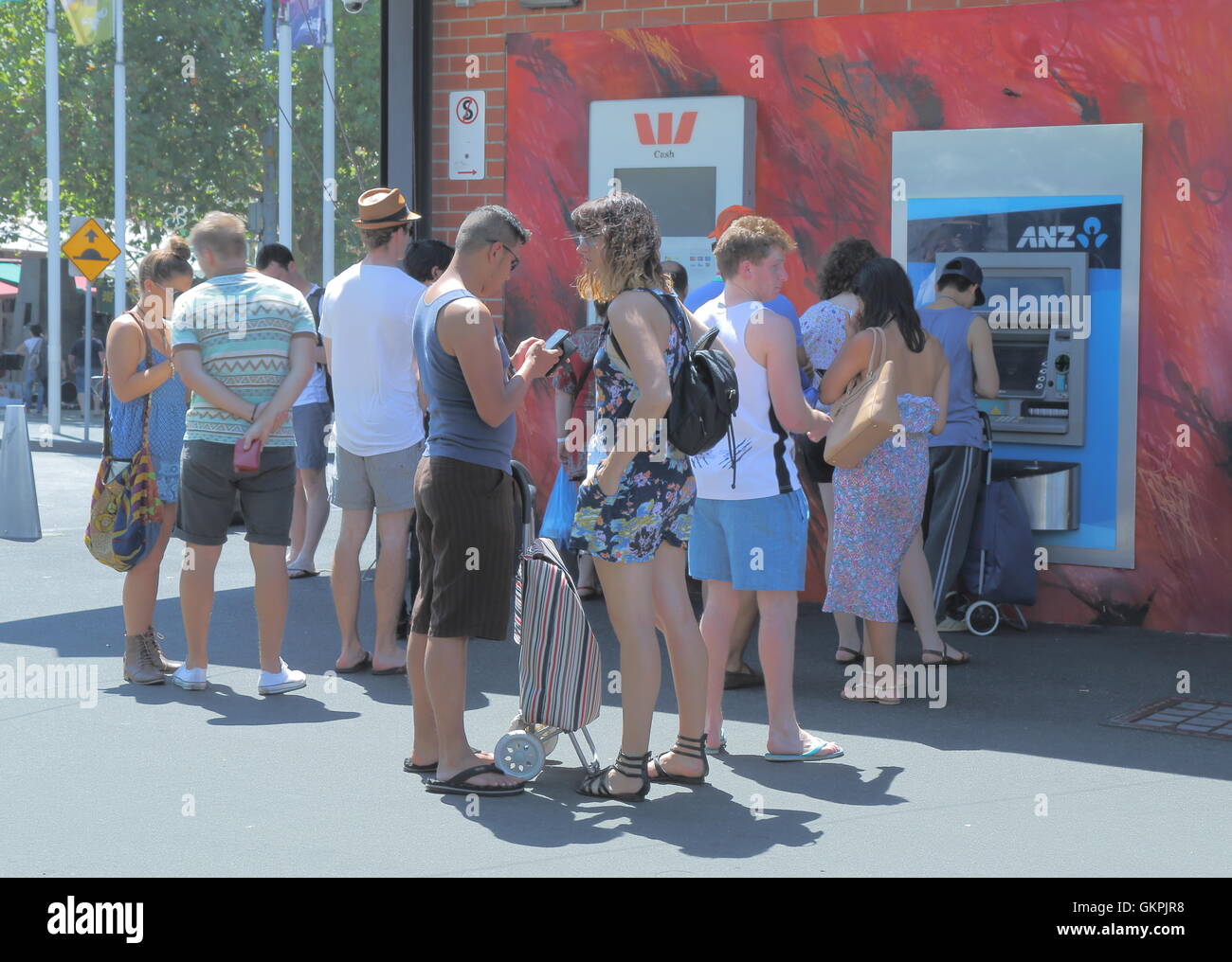 People queue for ATM in Melbourne Australia Stock Photo - Alamy