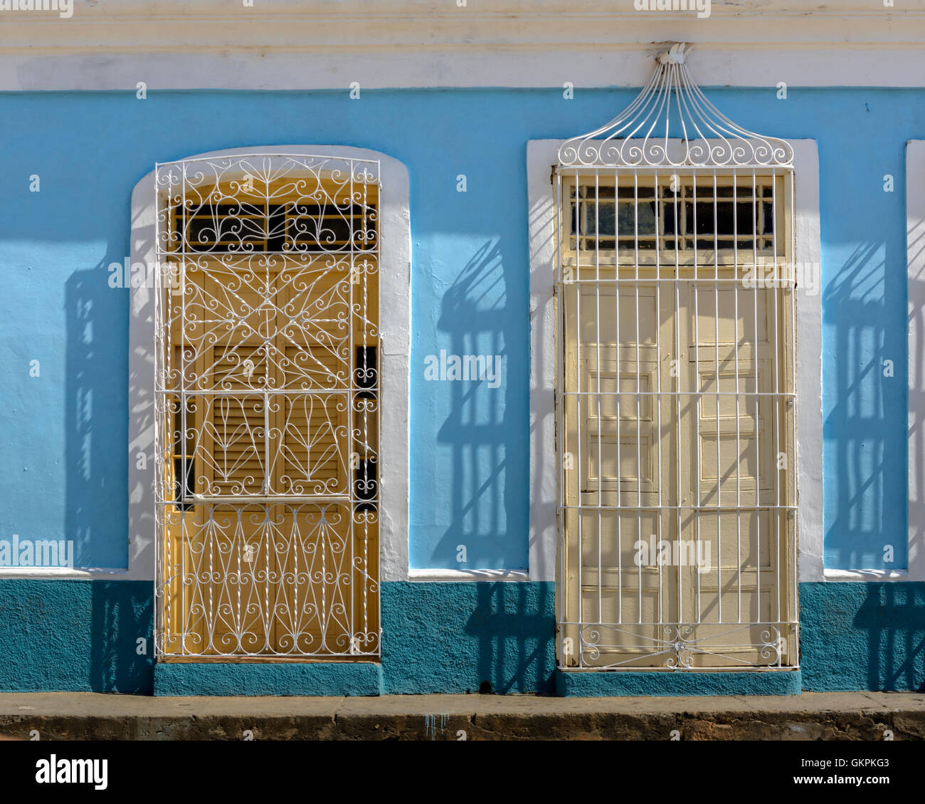 Traditional colonial architecture on a building facade in Trinidad ...