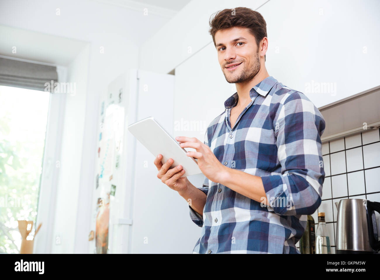Male person in checkered hi-res stock photography and images - Alamy