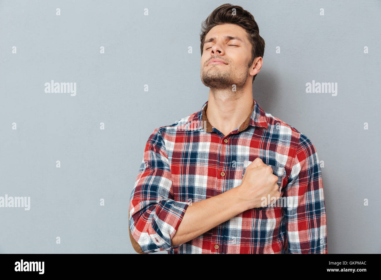 Young handsome man showing hi-res stock photography and images - Alamy