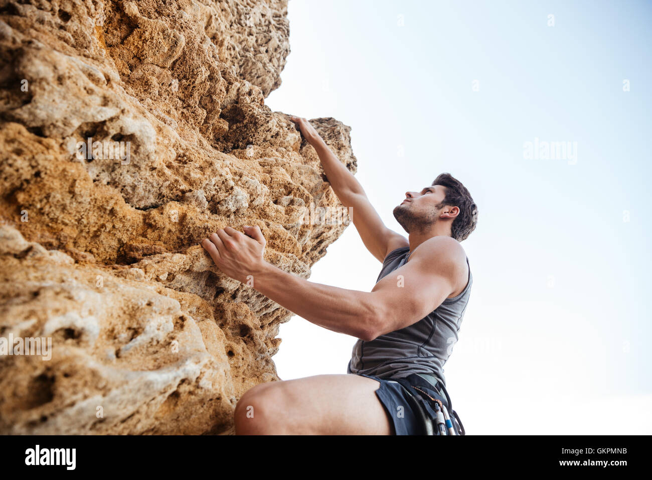Man Hanging On Cliff High Resolution Stock Photography and Images - Alamy