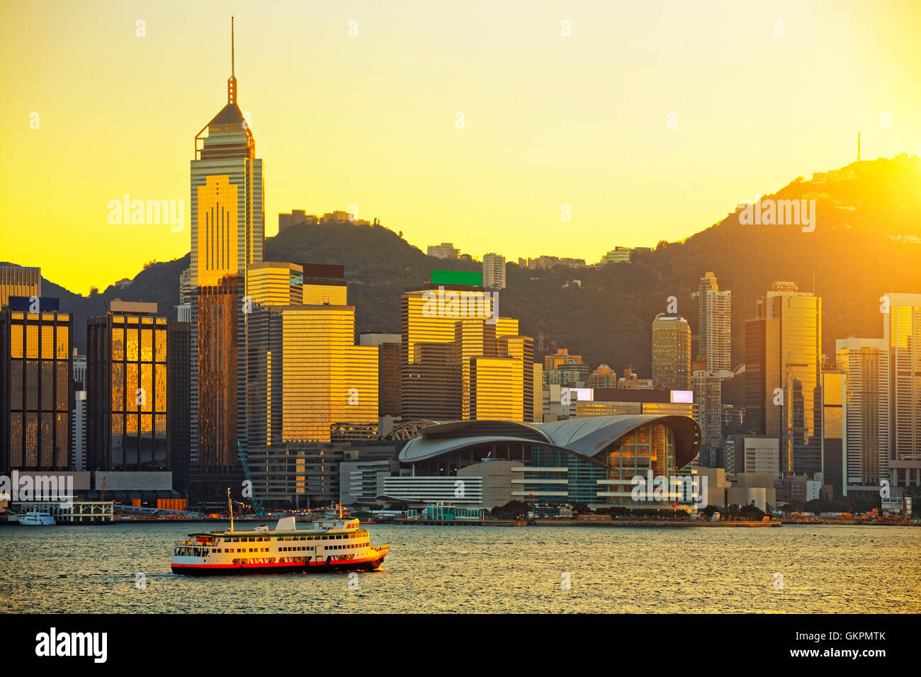 Hong Kong skyline in sunset Stock Photo - Alamy