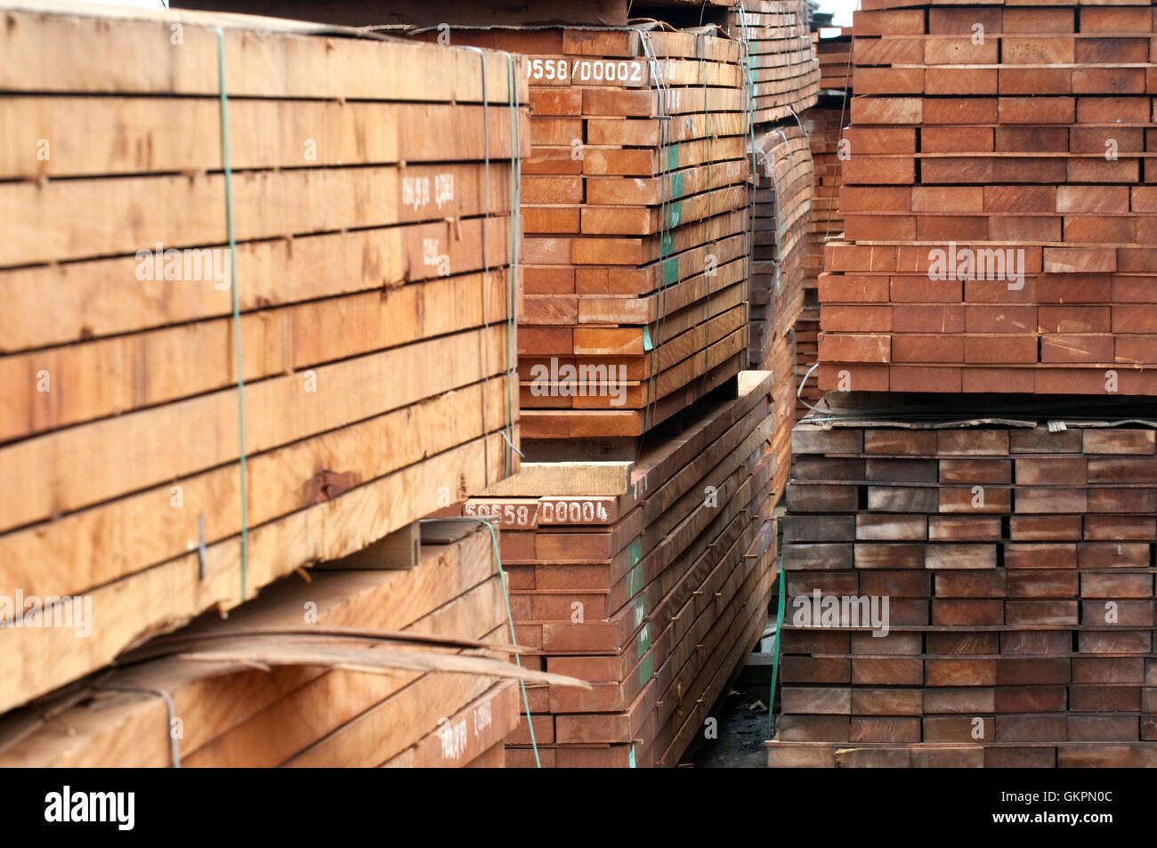 Stacked hard wooden planks Stock Photo - Alamy