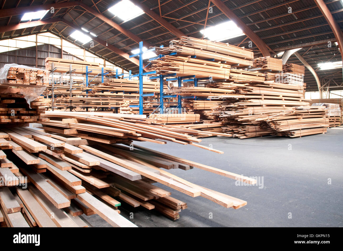 Warehouse with wood Stock Photo - Alamy