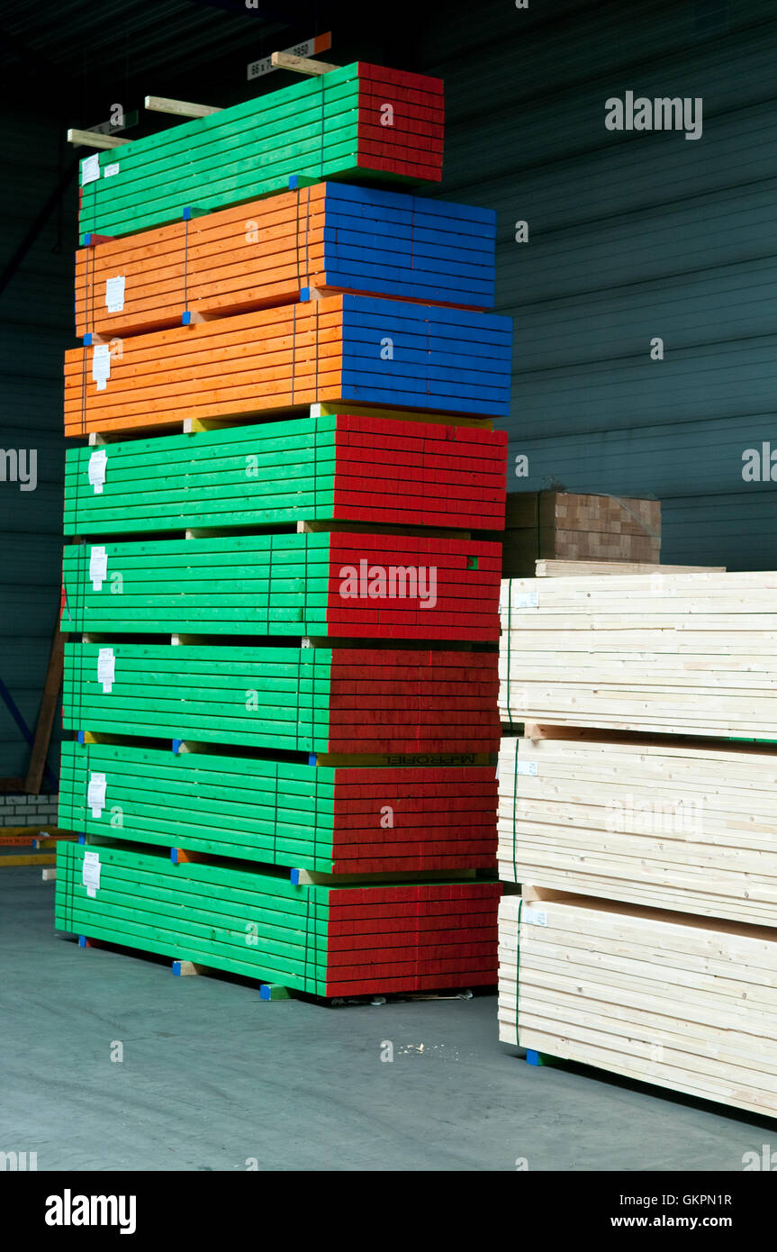 Stacked colour coded construction timber Stock Photo - Alamy