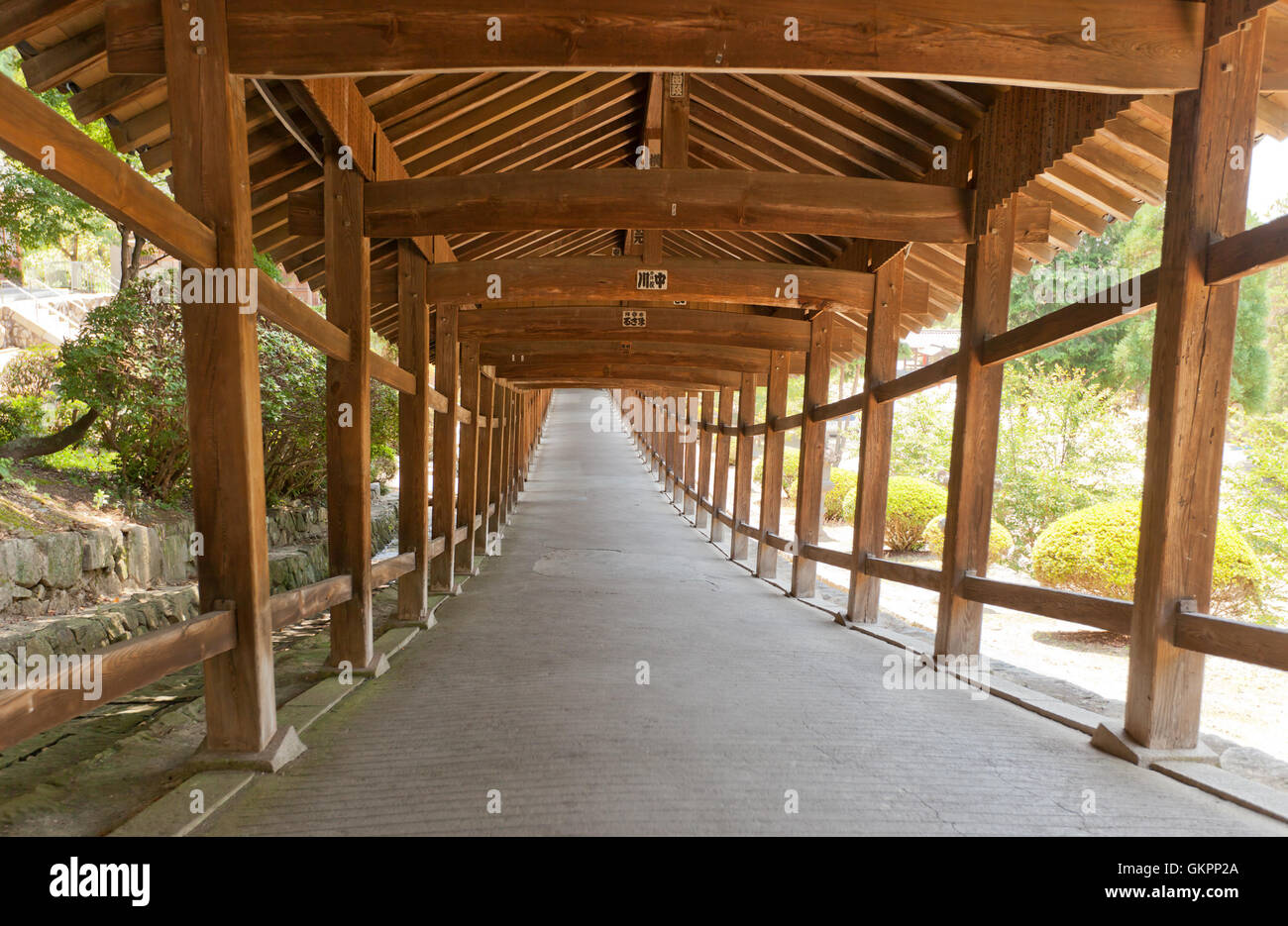 Inside view of 400 meter long covered walkway at Kibitsu Shinto Shrine ...