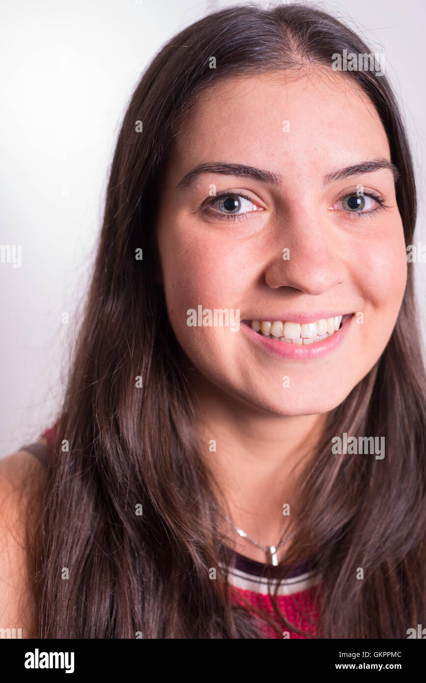 portrait sporty young girl smiling into camera Stock Photo - Alamy