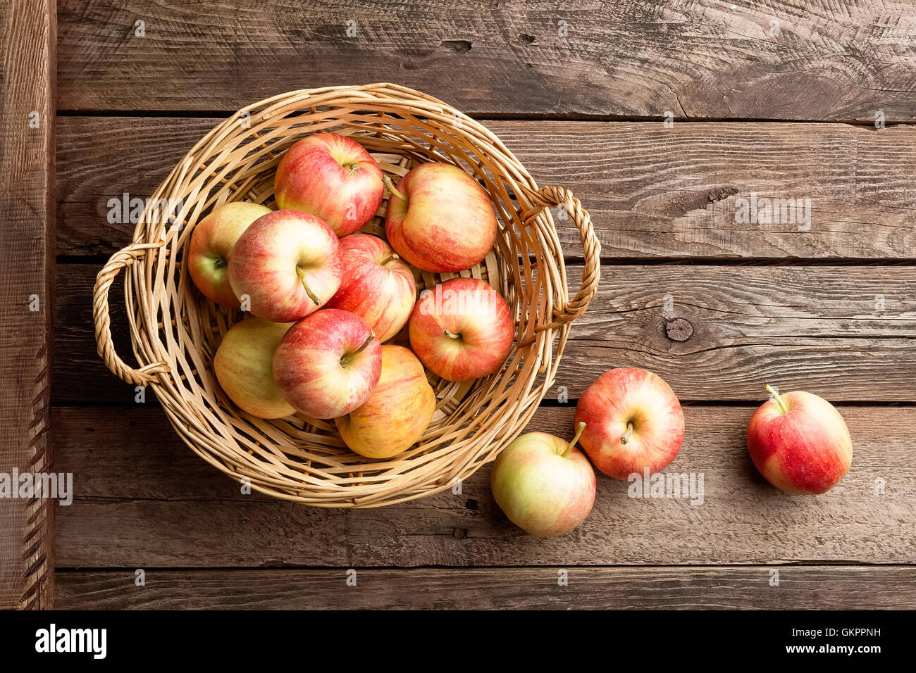 Red apples in basket on hi-res stock photography and images - Alamy