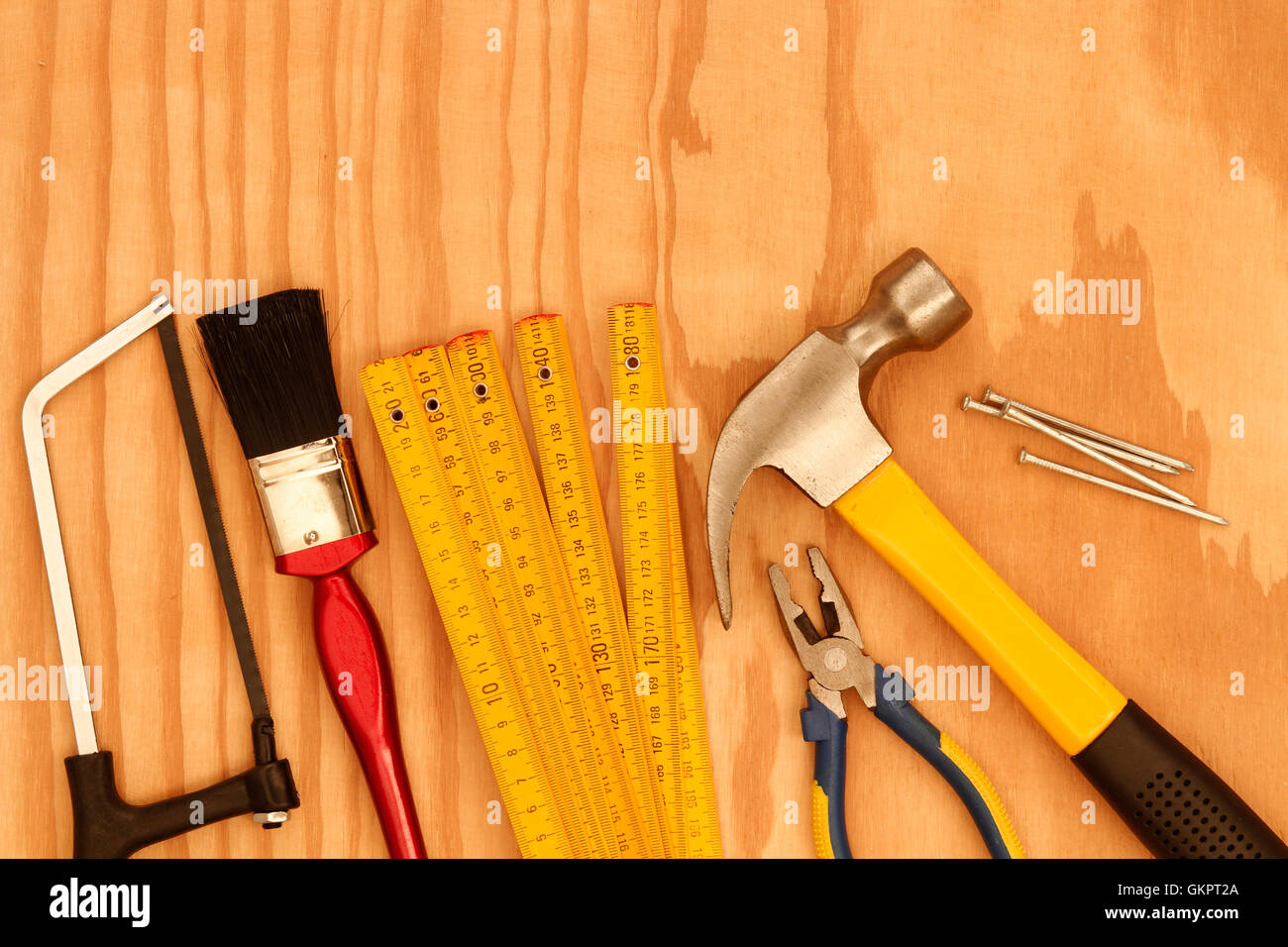 Assorted work tools on wood Stock Photo - Alamy