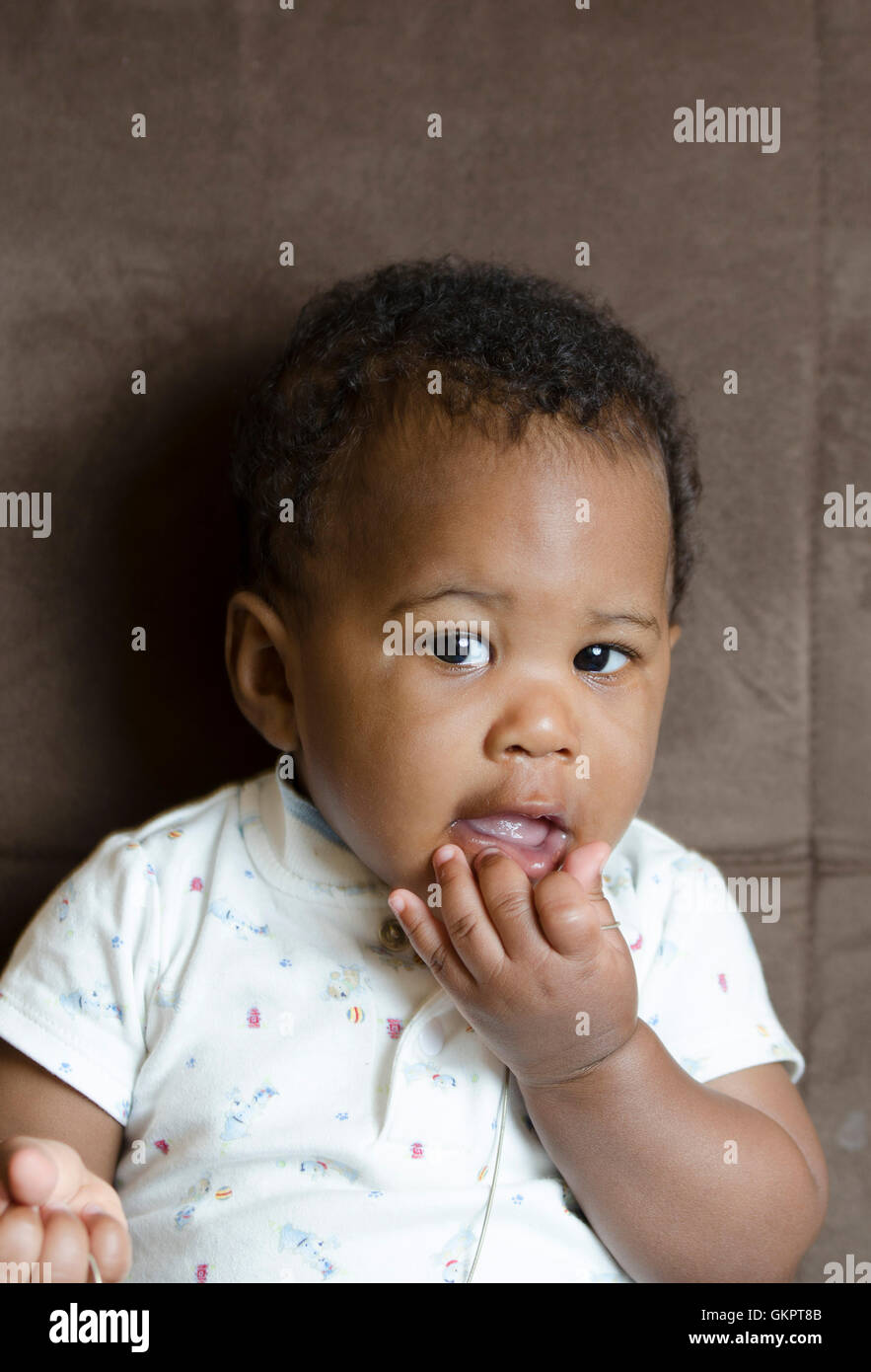 African American baby staring into the camera Stock Photo - Alamy