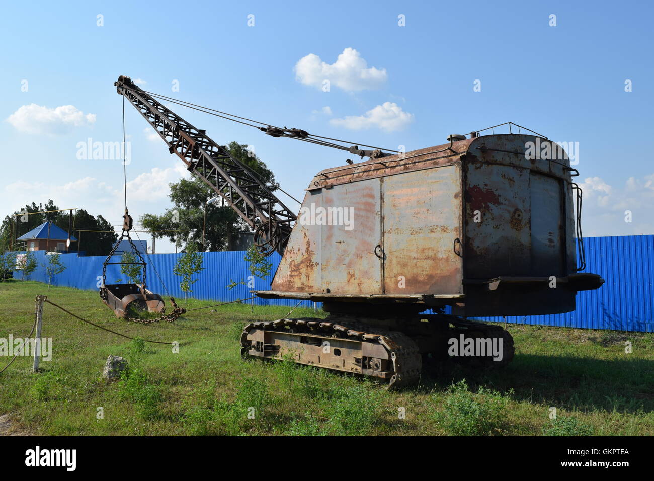 Old quarry near the dragline. Old equipment for digging the soil in ...