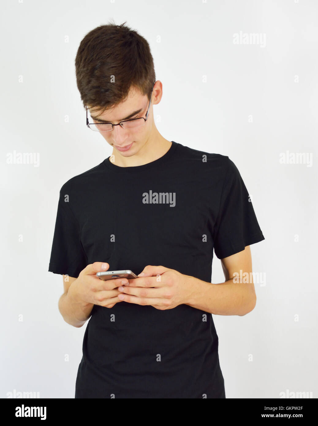 Boy texting teenage hi-res stock photography and images - Alamy