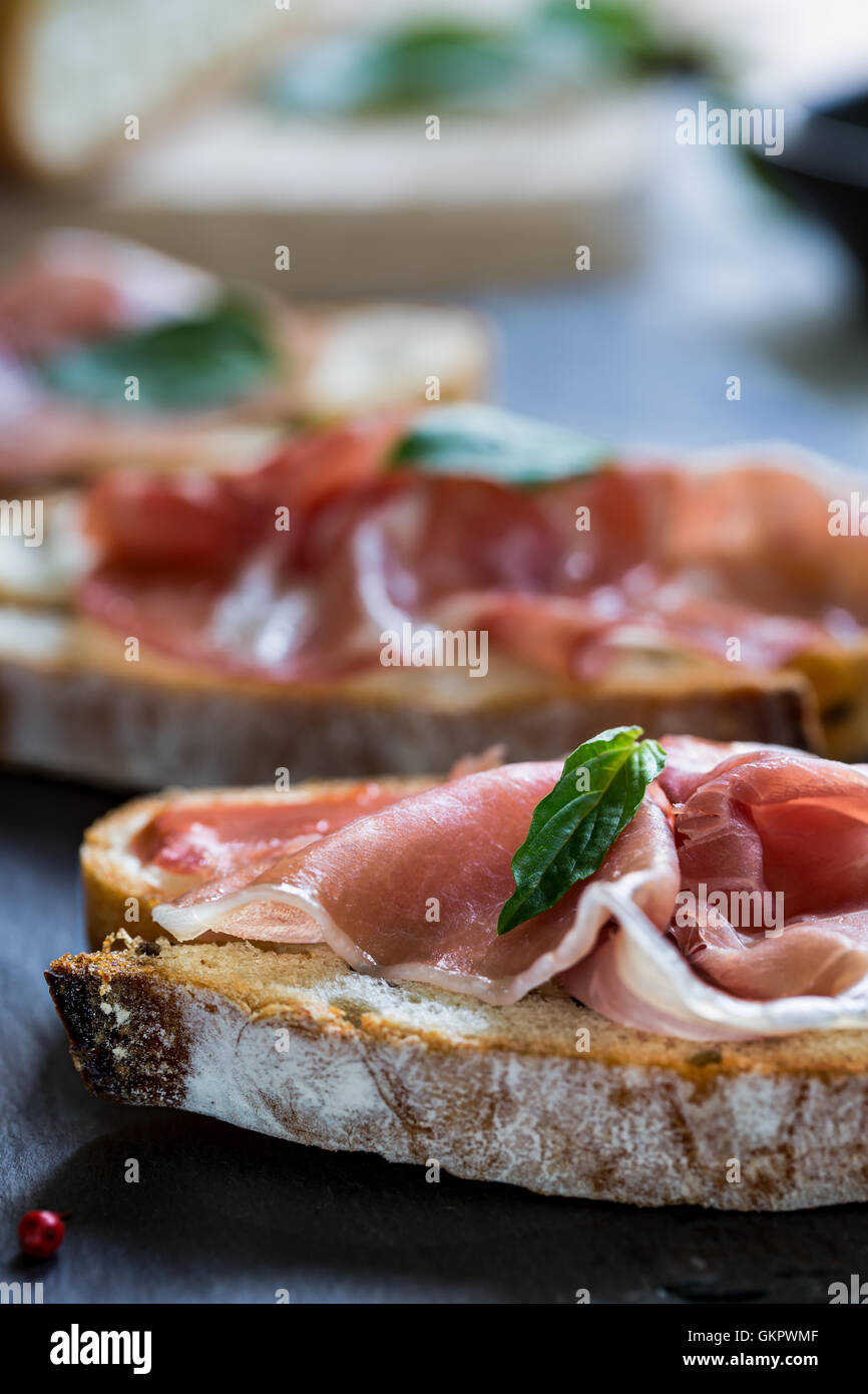 Varieties of Prosciutto, Coppa and Salami Bruschetta Stock Photo - Alamy