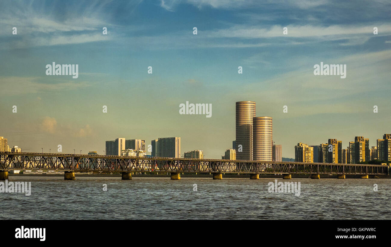 south bank sunset skyline behind Chien Tang River Bridge over Qiantang ...