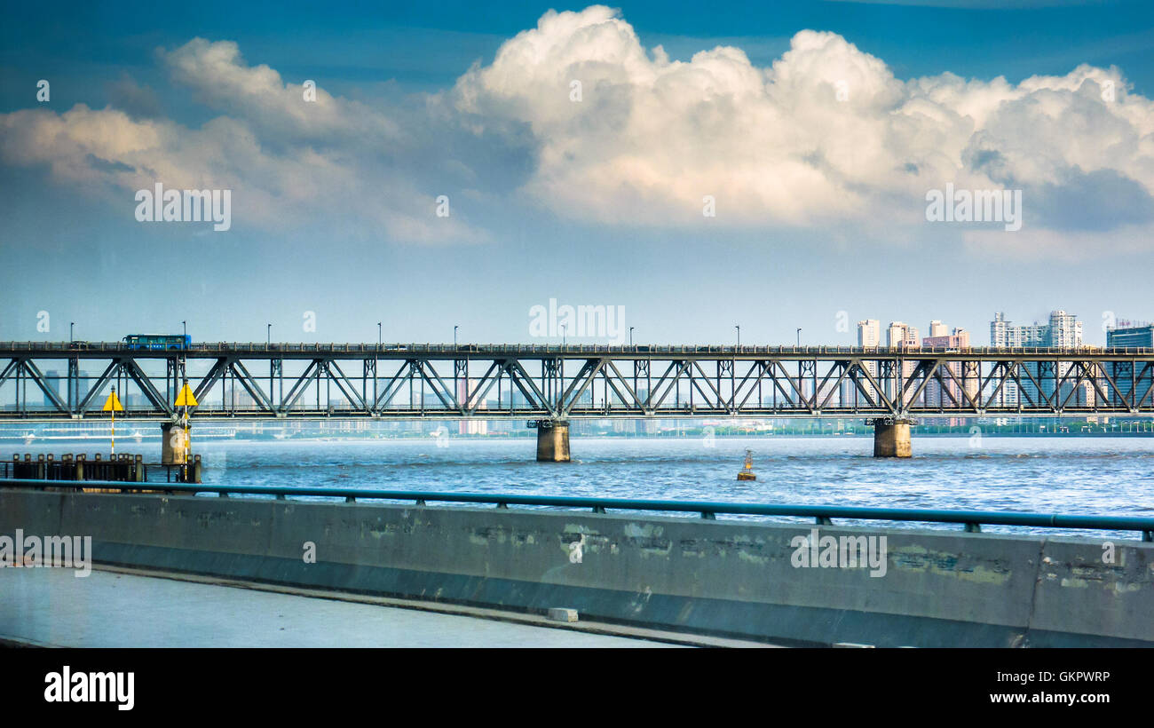 Chien Tang River Bridge under blue sky, a truss steel bridge with road ...