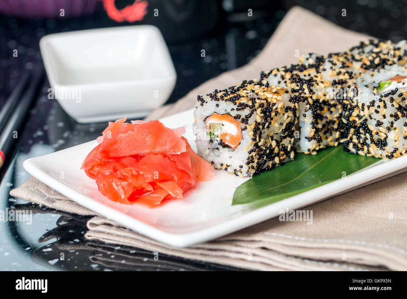 Salmon and black caviar rolls Stock Photo - Alamy