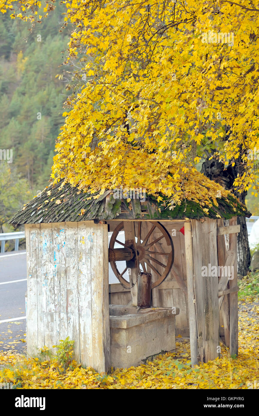 country wooden draw well in autumn time Stock Photo - Alamy