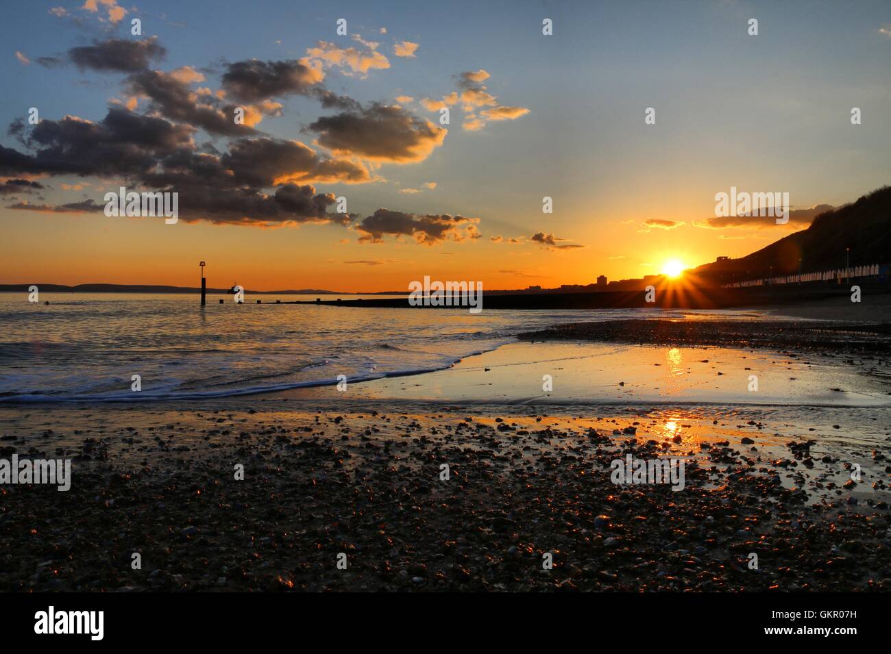 Southbourne Beach with clouds at Sunset Stock Photo - Alamy
