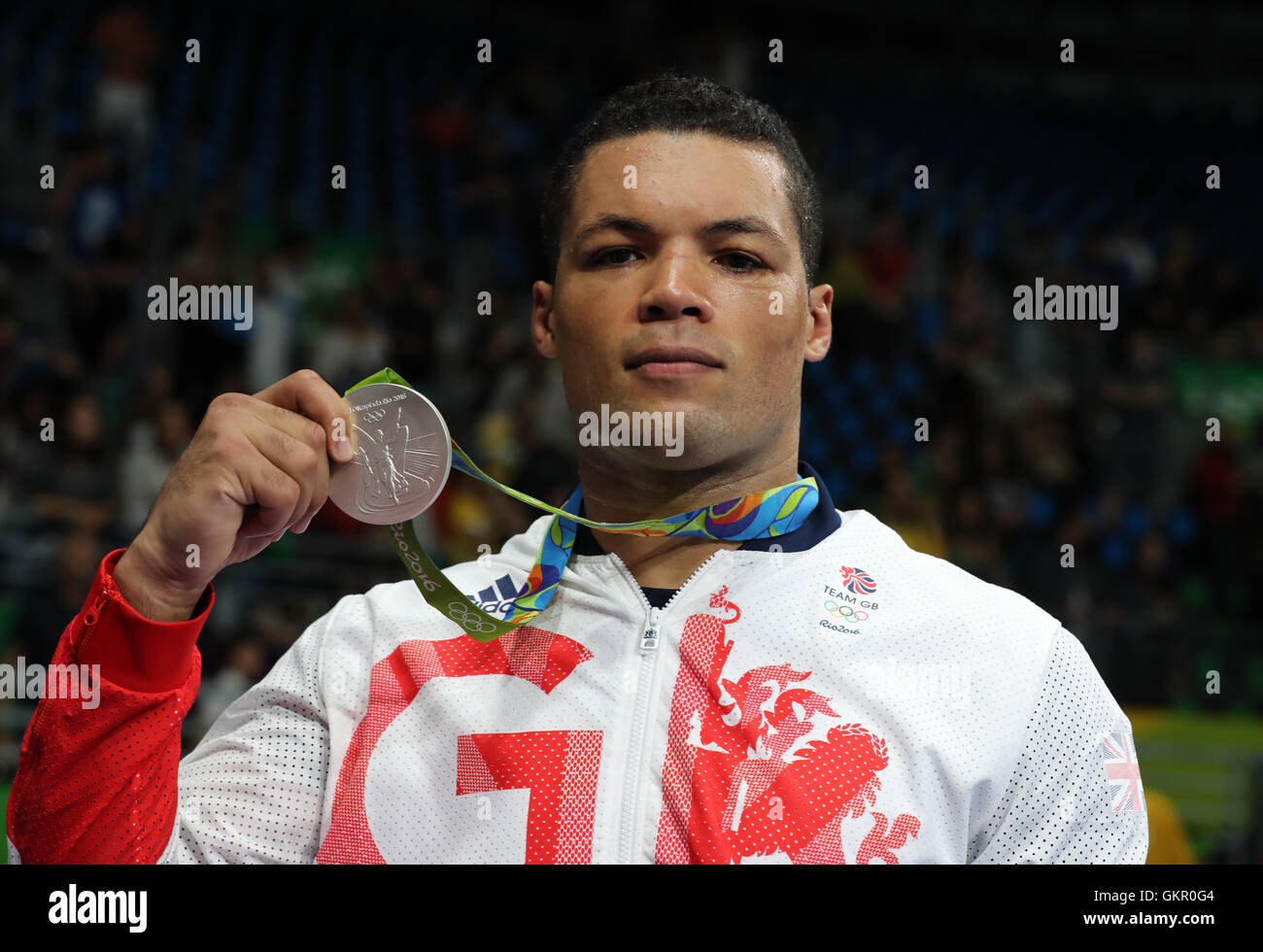 Great Britain's Joe Joyce with his silver medal following his defeat to ...
