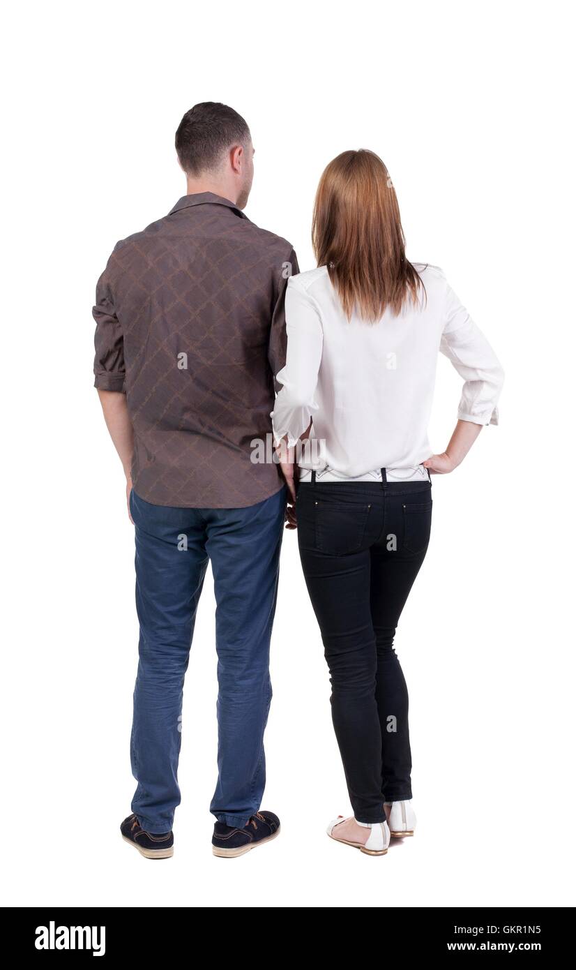 Back view of young embracing couple Stock Photo - Alamy