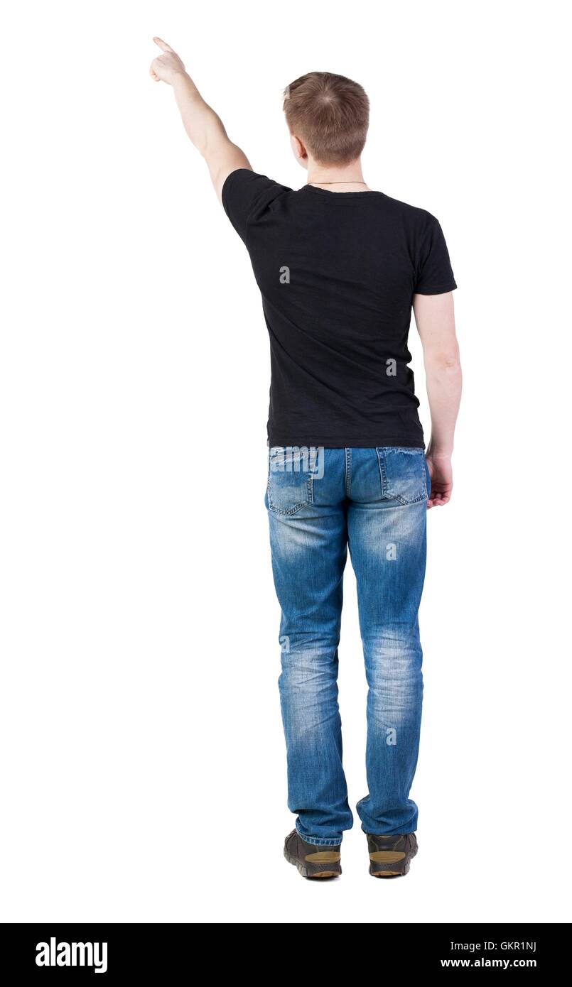 Back view of pointing young men in t-shirt and jeans Stock Photo - Alamy