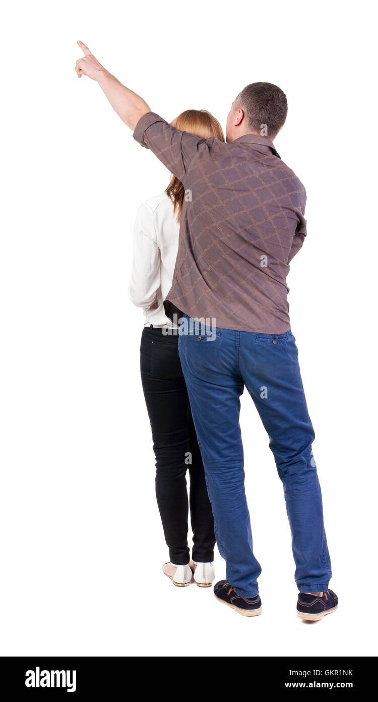 young couple pointing Stock Photo - Alamy
