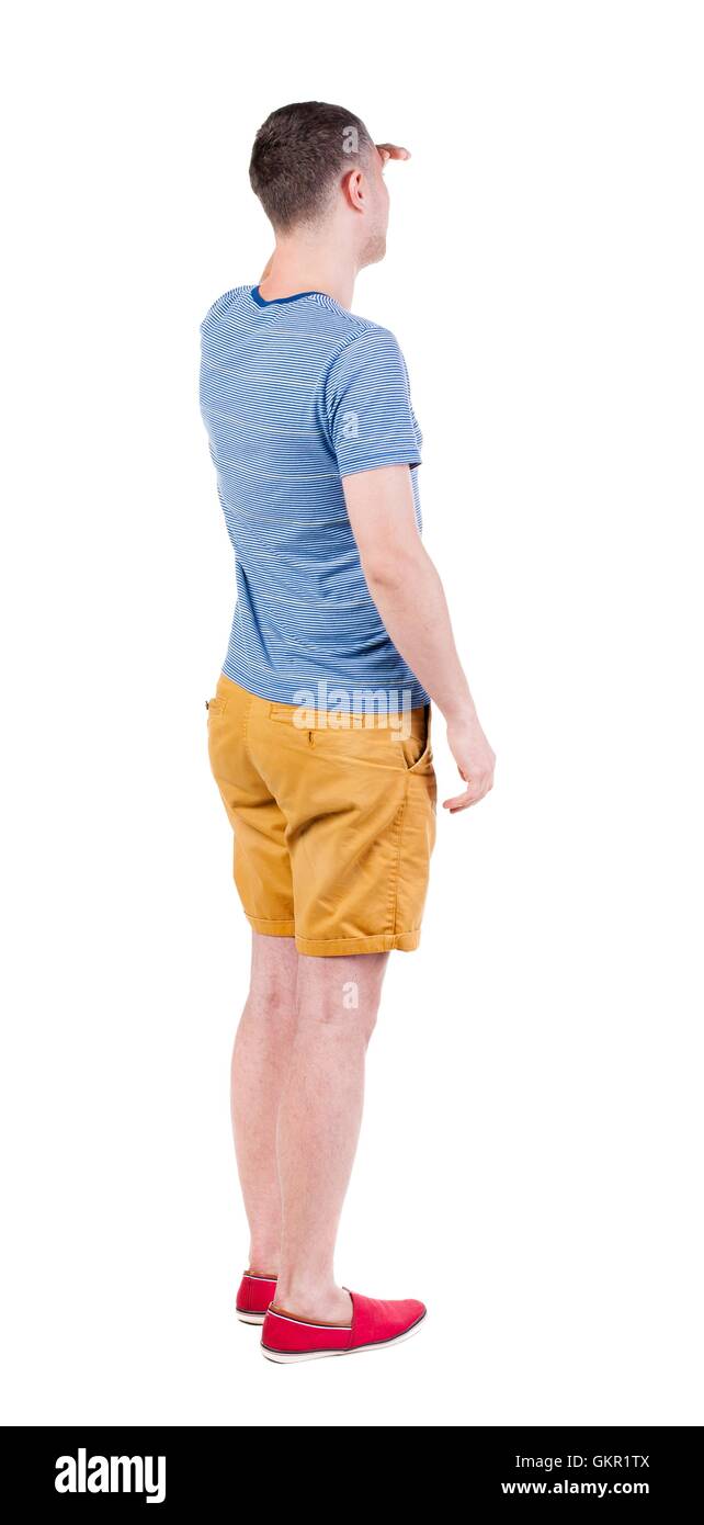 Back view of young manin shorts looking Stock Photo - Alamy