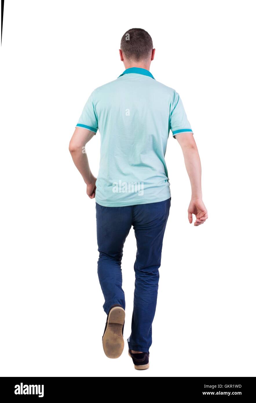 Back view of running man in blue polo Stock Photo - Alamy