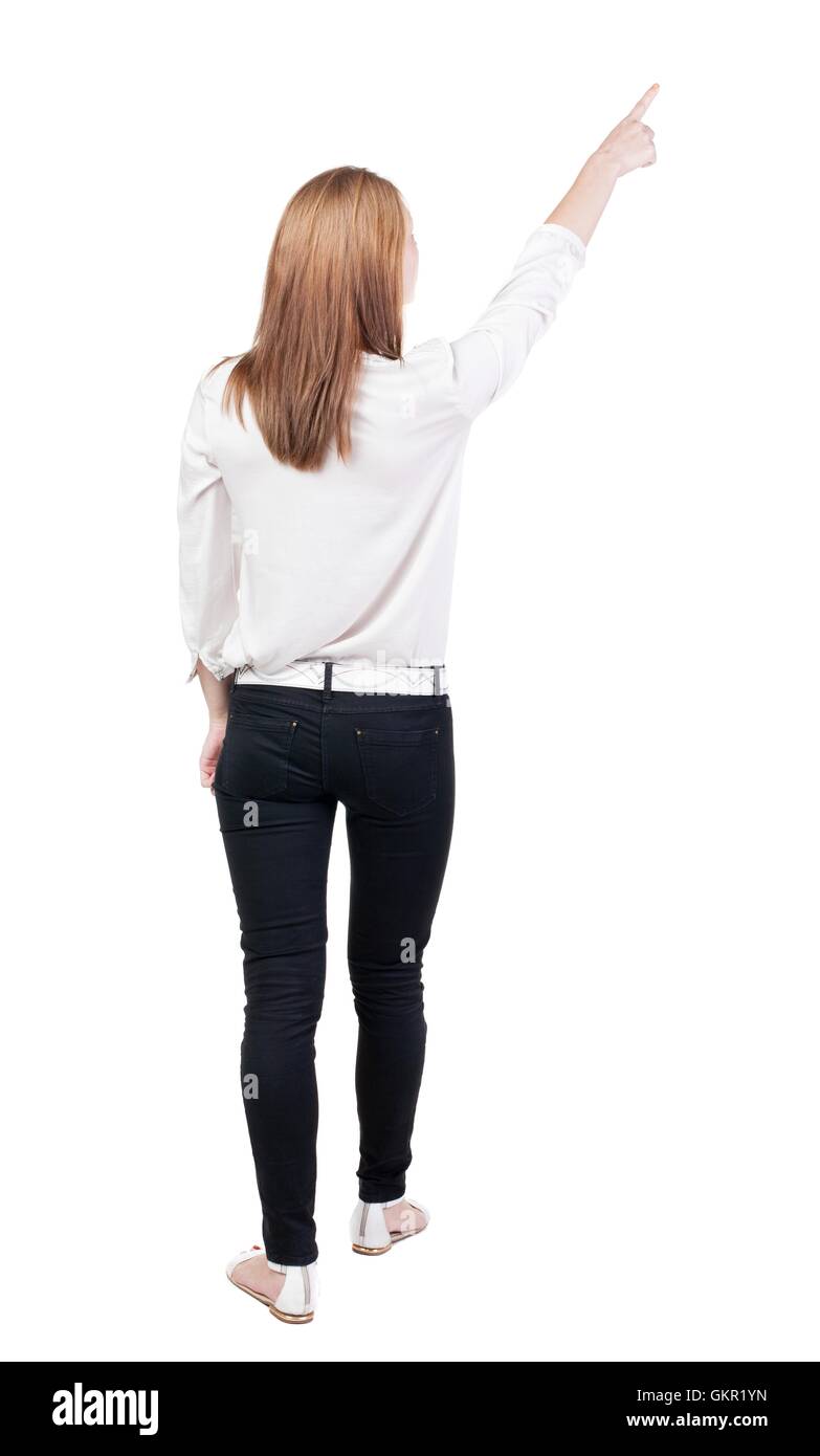 Back view of pointing woman Stock Photo - Alamy