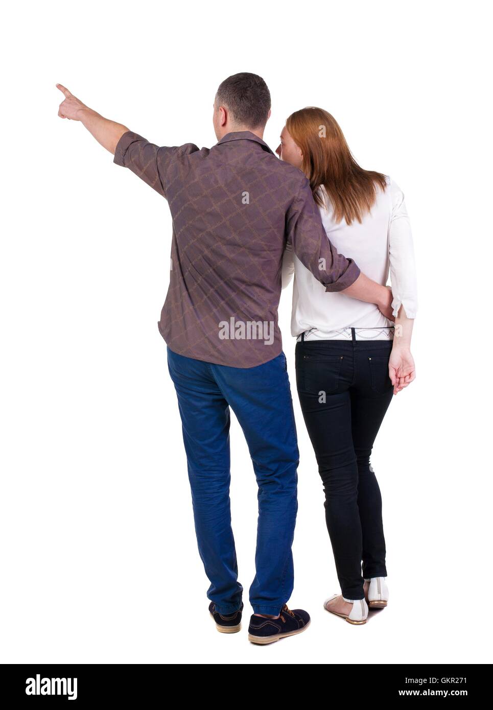 young couple pointing Stock Photo - Alamy