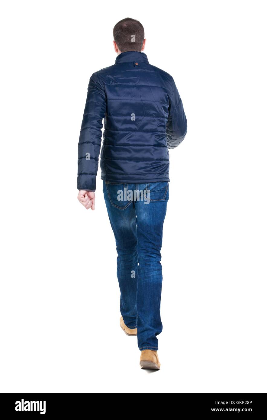 Back view of going handsome man in jeans and jacket Stock Photo - Alamy