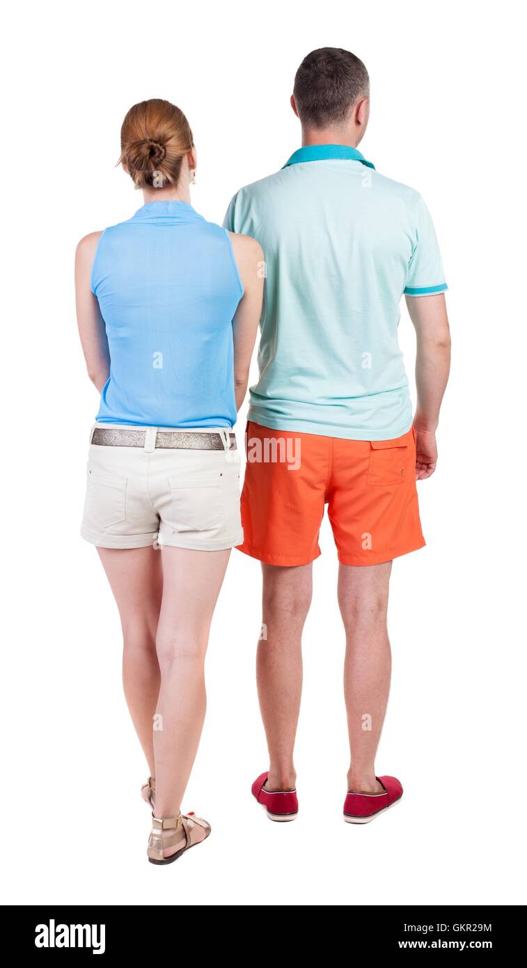 Back view of young embracing couple Stock Photo - Alamy