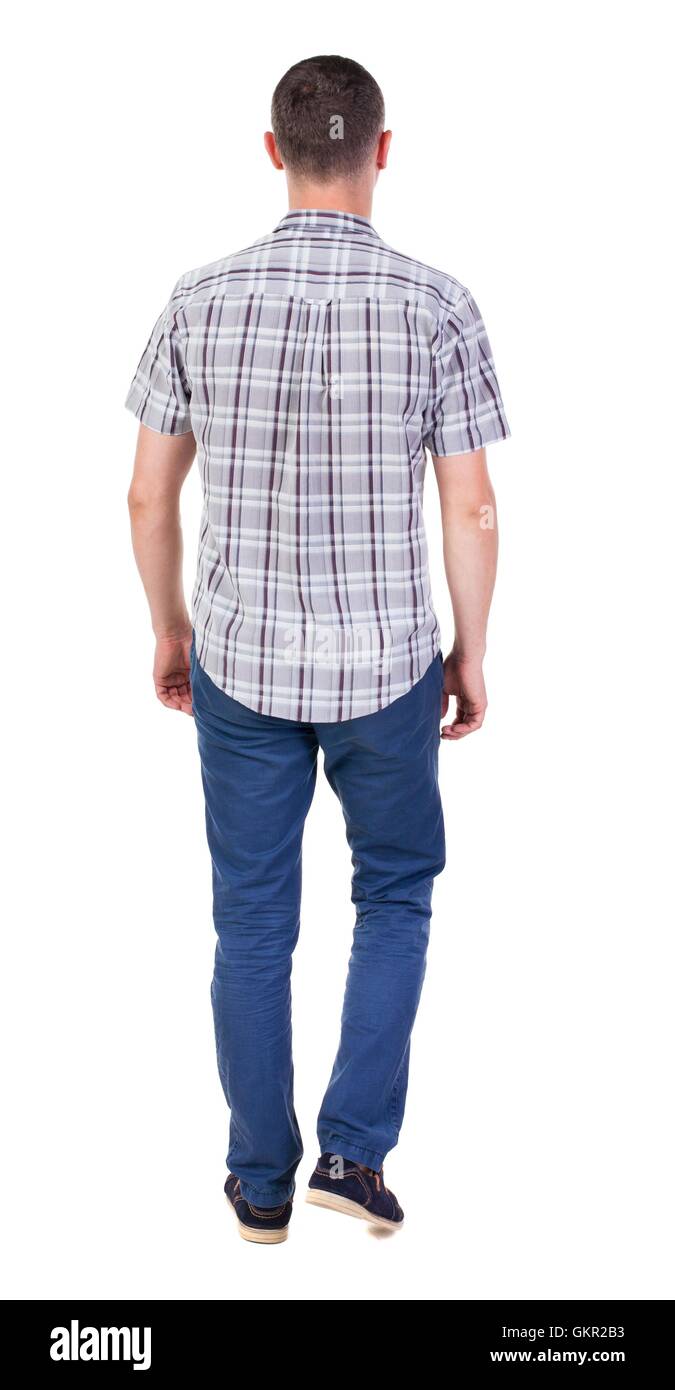 Back view of going handsome man in jeans and a shirt Stock Photo - Alamy