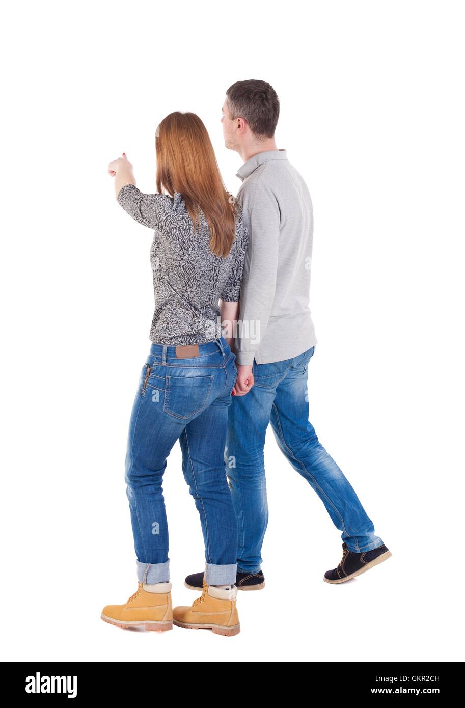 Back view of walking young couple Stock Photo - Alamy