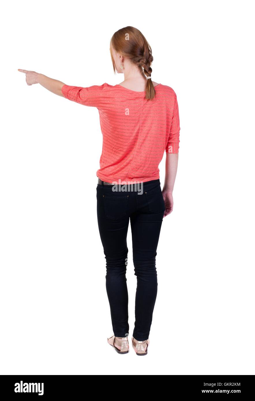 Back view of pointing woman Stock Photo - Alamy