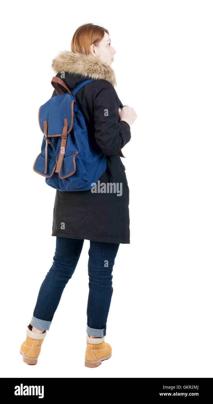Back view woman in winter jacket with backpack Stock Photo - Alamy